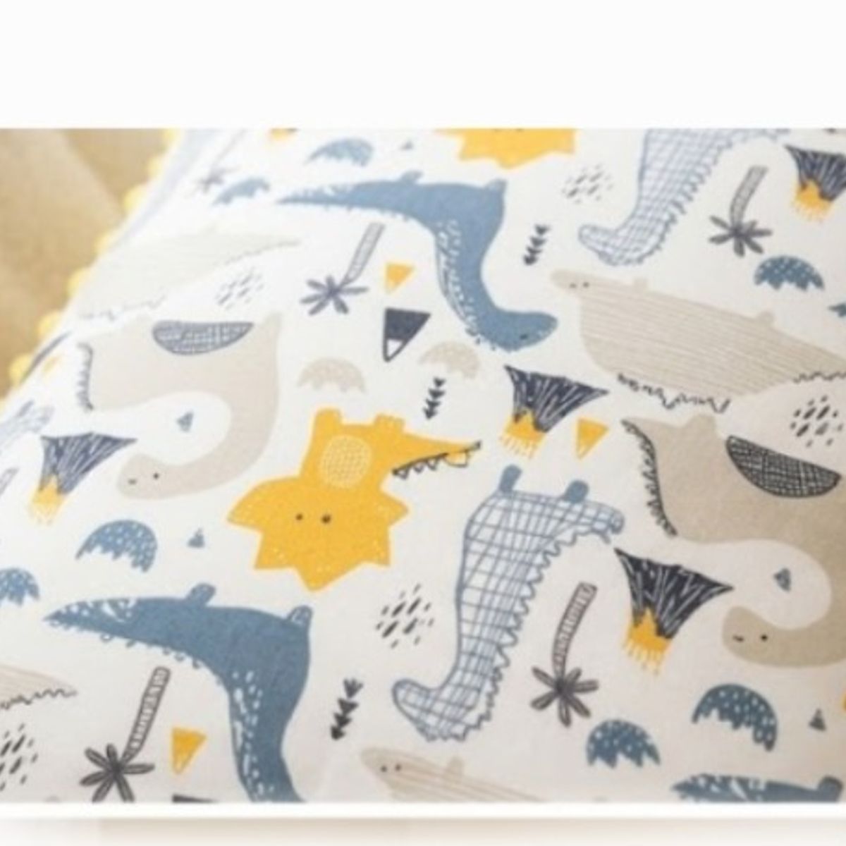almohada para niños pequeños de doble cara celeste con dinosaurios ...